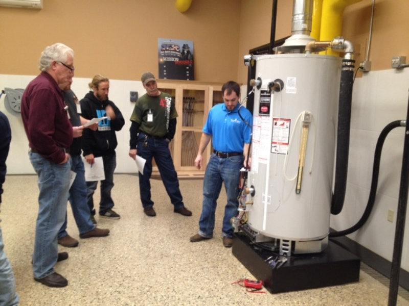 Hands-on training for plumbing contractors at Bradford White's iTEC ...